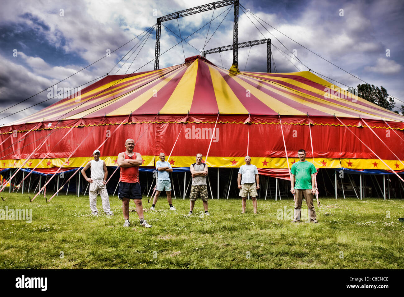 Polish Circus workers outside the Circus reed and yellow Stock Photo ...