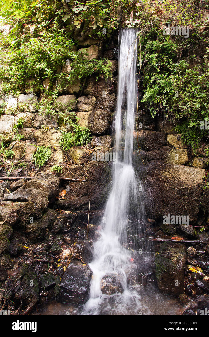 water flowing from a traditional irrigation channel Stock Photo - Alamy