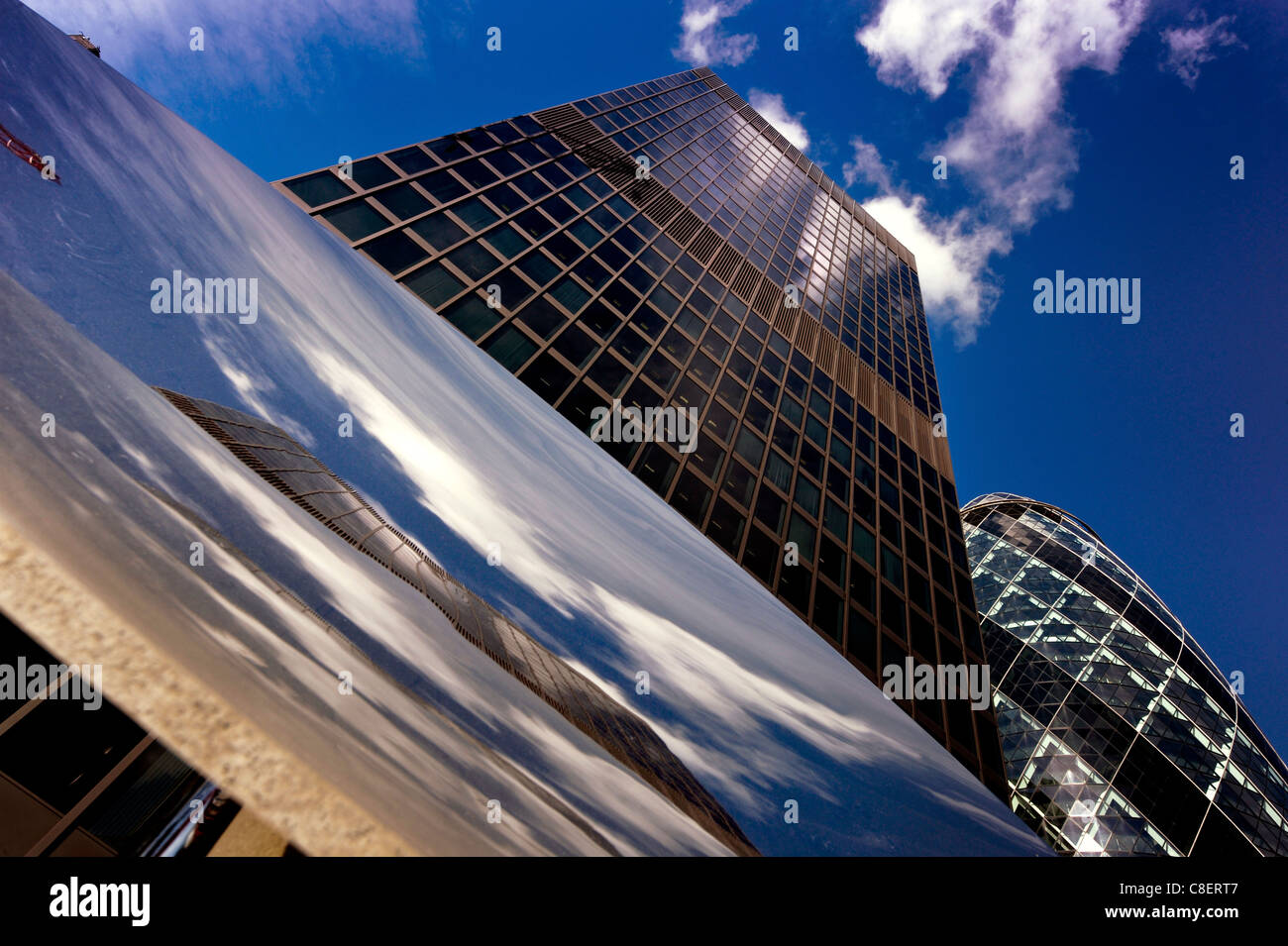 The Aviva building and Gherkin with the sky mirror sculpture by Anish ...