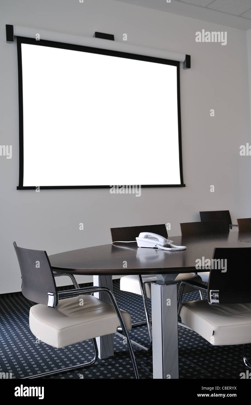 Empty office meeting room with white projector screen Stock Photo - Alamy