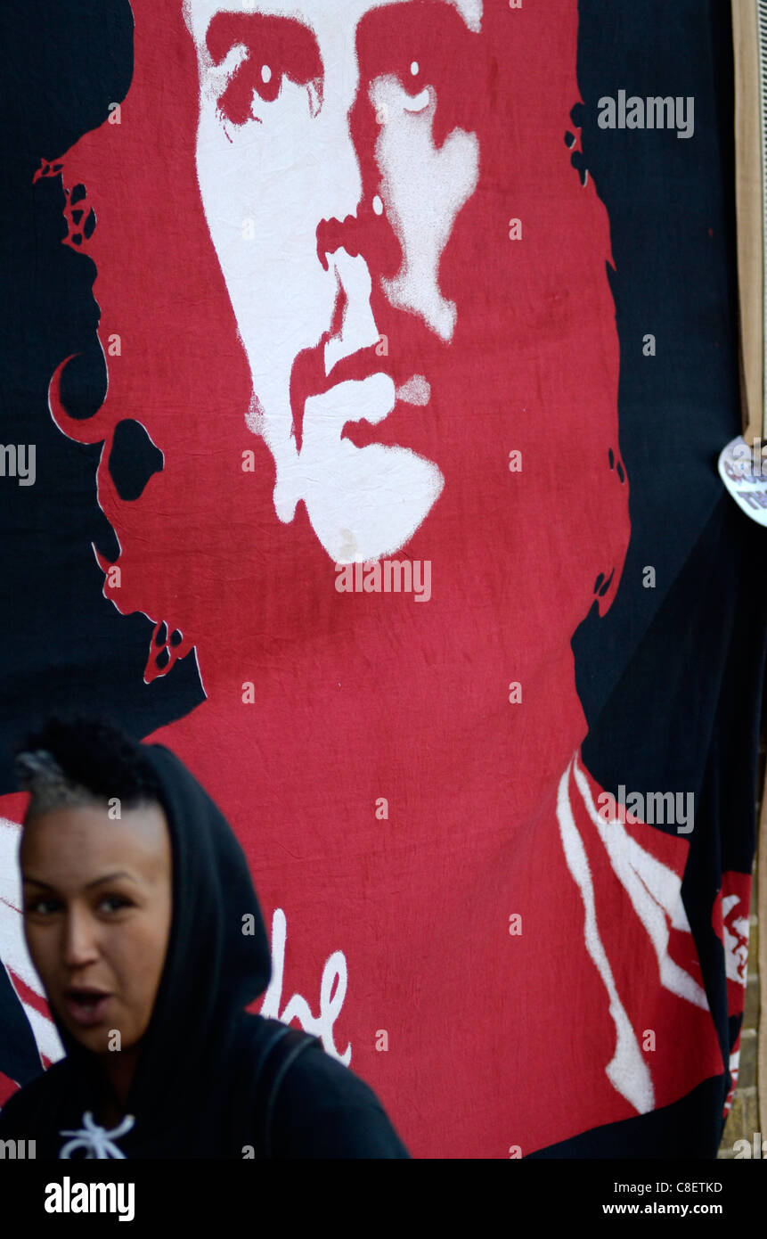 Che Guevara fabric poster with hooded girl in foreground Camden London ...