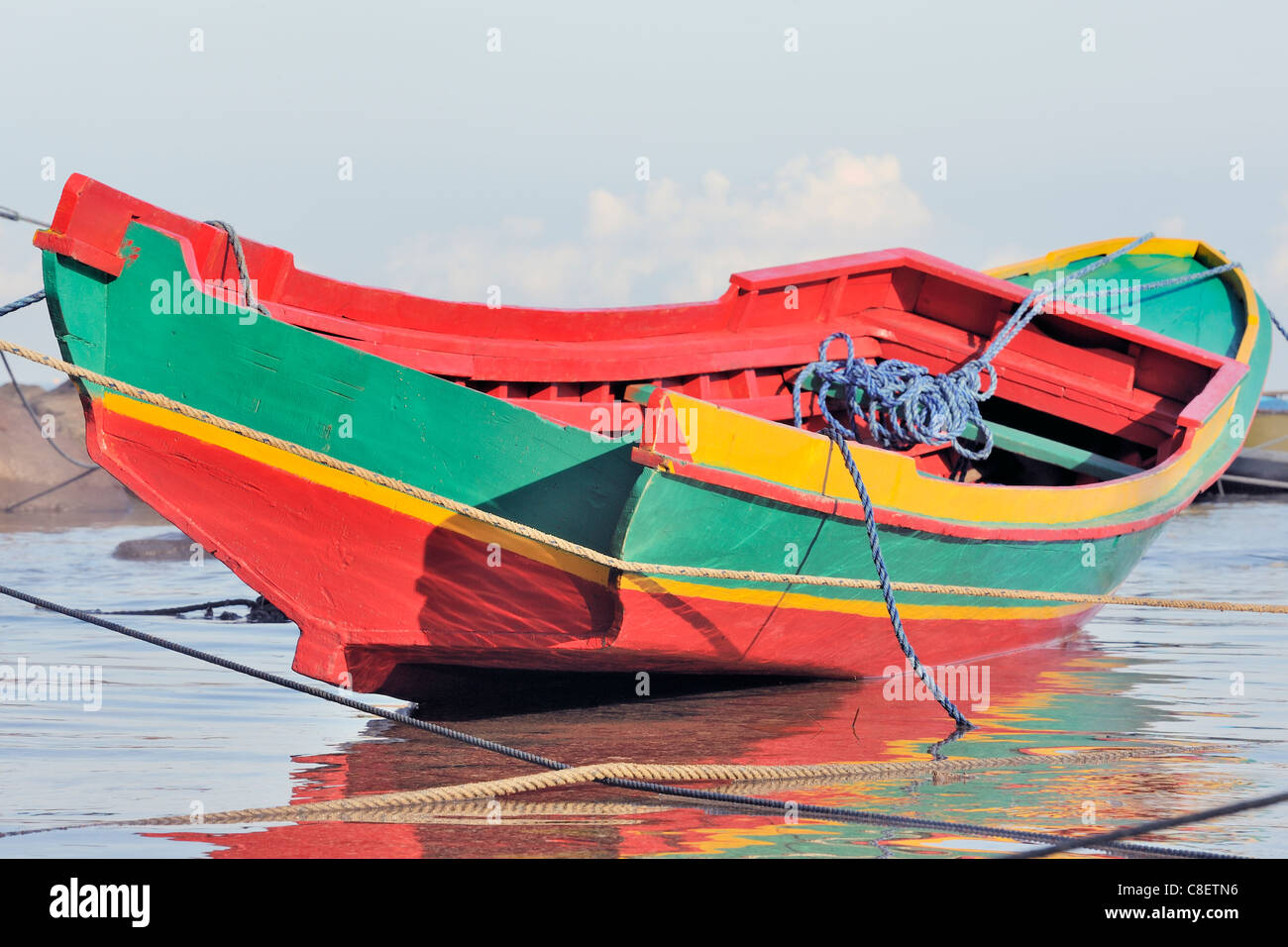 Brightly colored indonesian fishing boat Stock Photo - Alamy