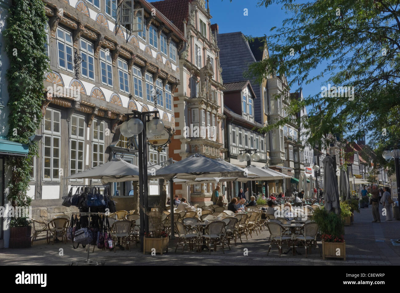 Medieval gables form a background to pavement cafes in Hamelin, Lower ...