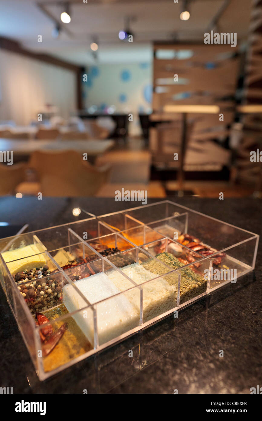 Spices and seasonings in a tray on a kitchen counter Stock Photo - Alamy