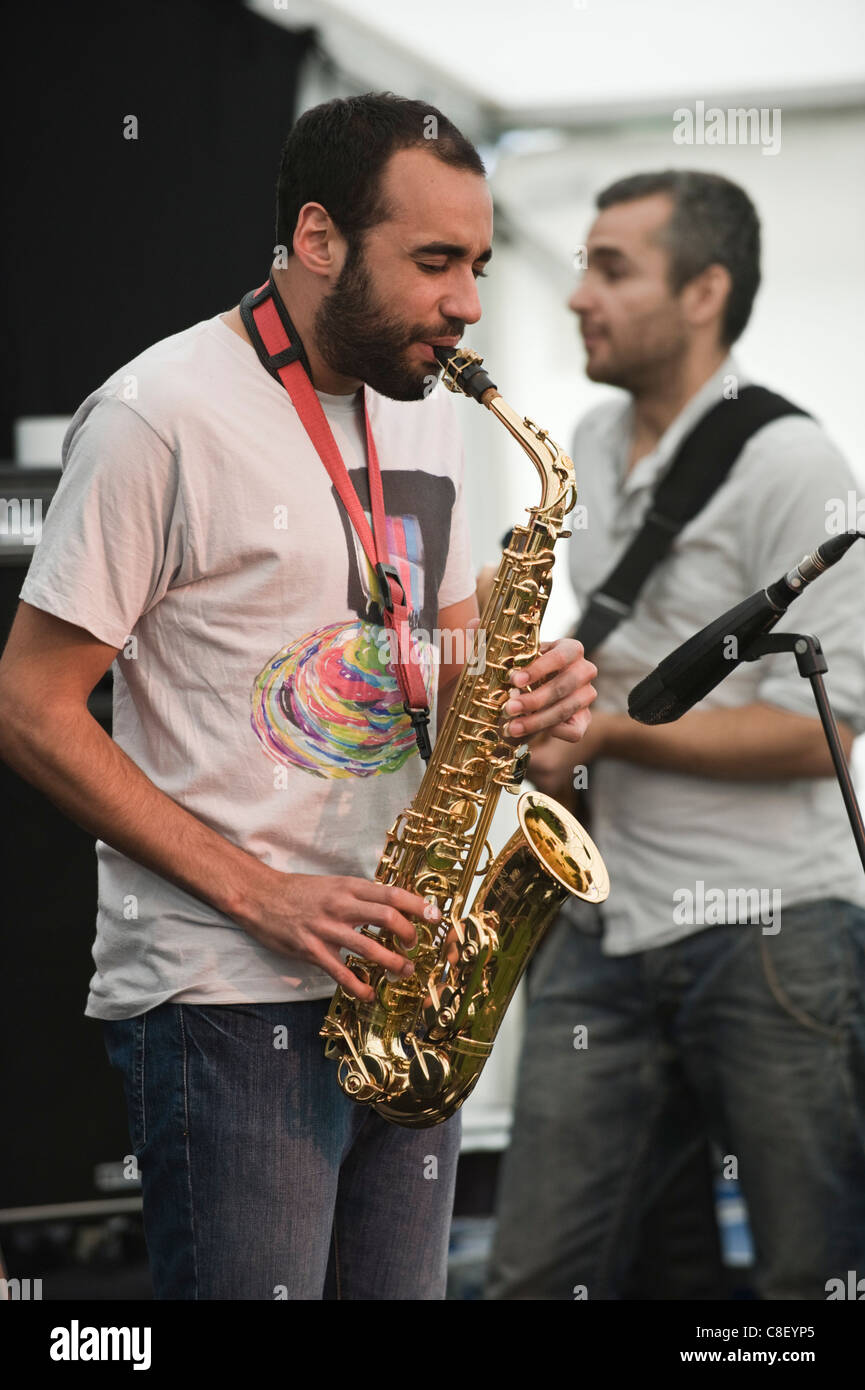 Saxophonist with Led Bib playing on stage at Brecon Jazz Festival 2011 ...