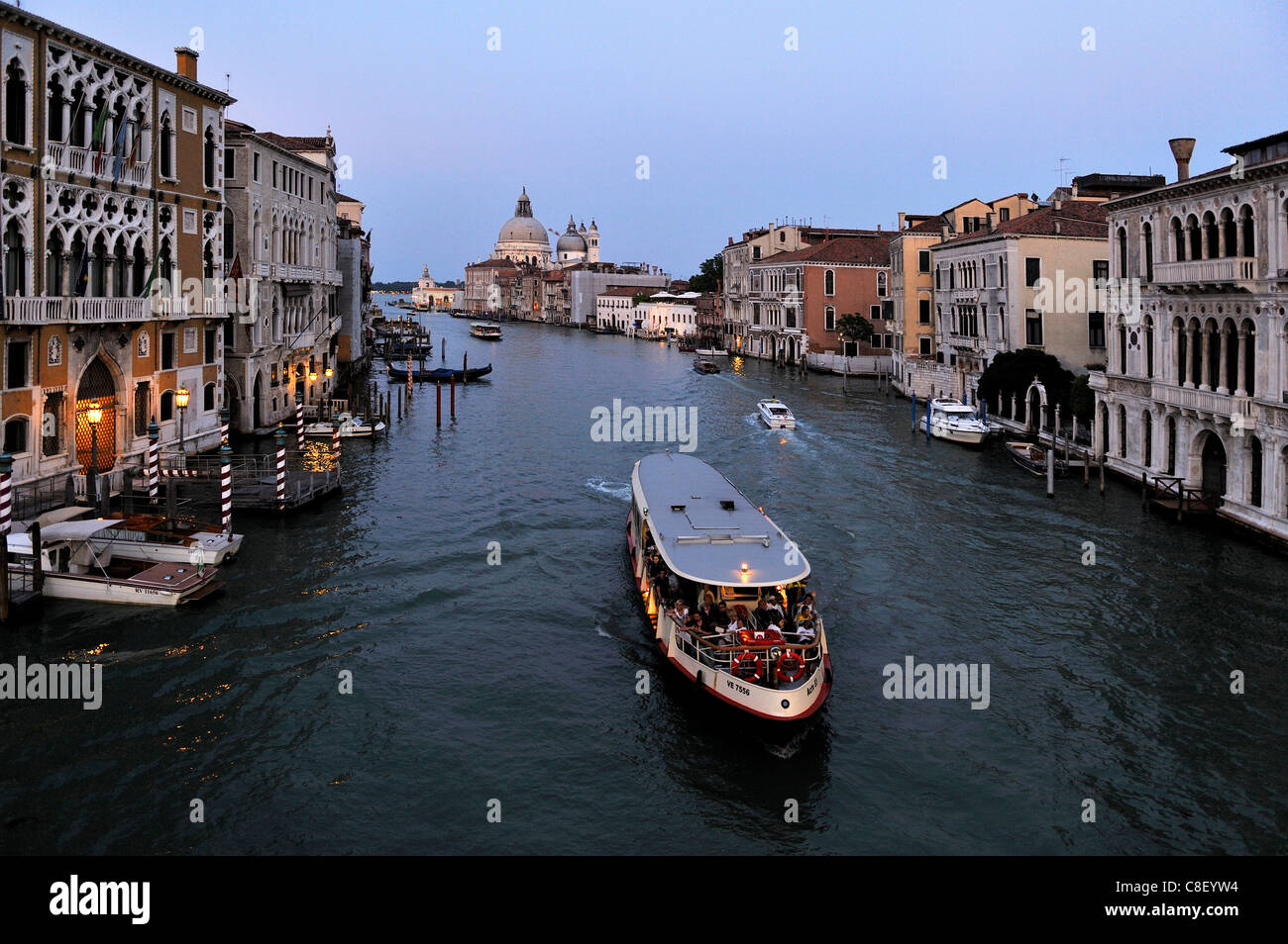 Evening view of a vaporetto (water bus) on the Grand Canal, Venice ...