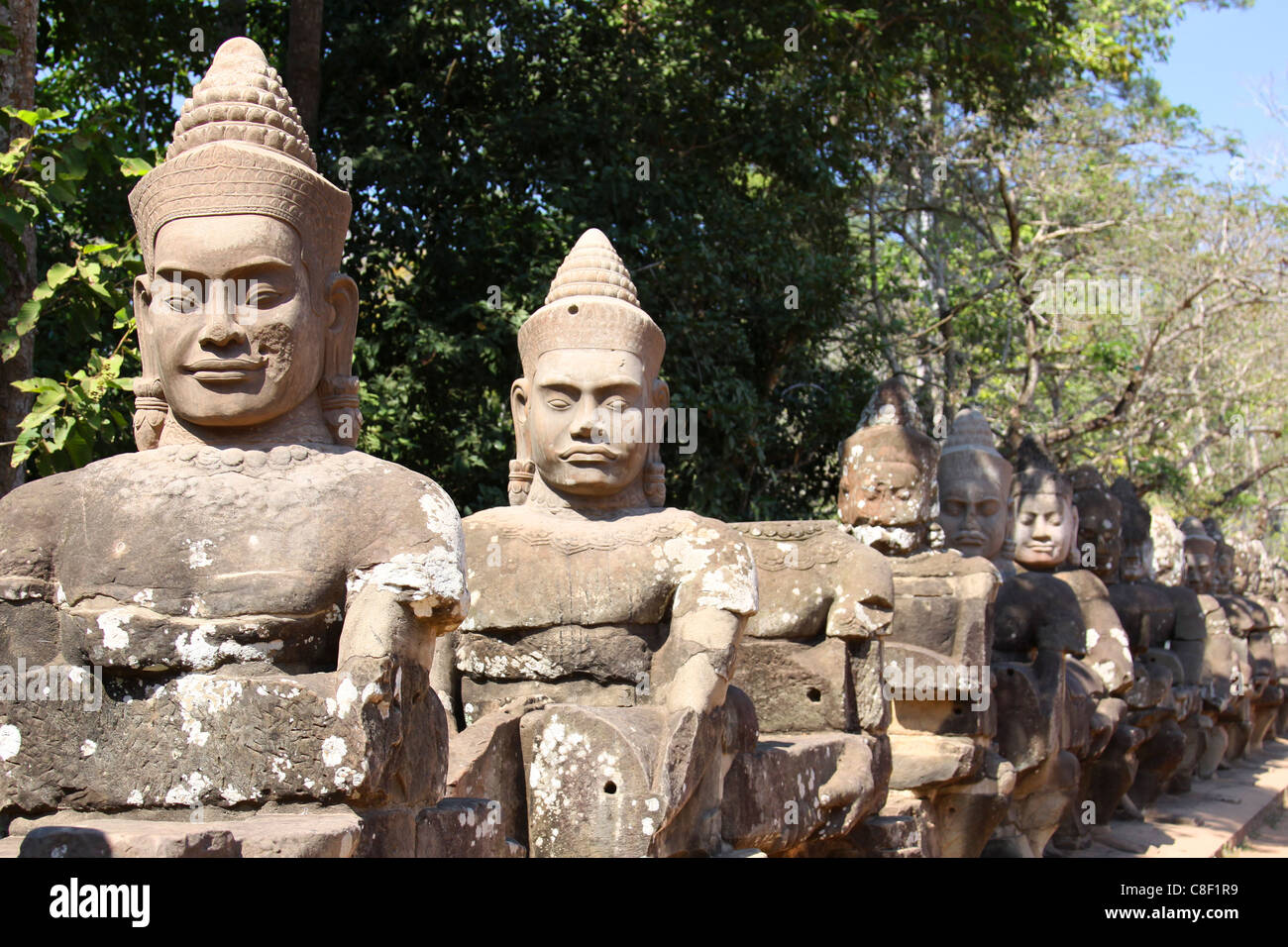 Angkor Thom statues of Hindu devas (guardian gods) lining road to south ...