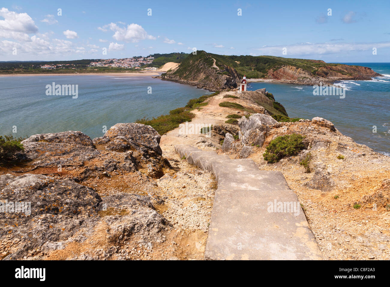São Martinho- keyhole bay entrance and path to lighthouse Stock Photo ...