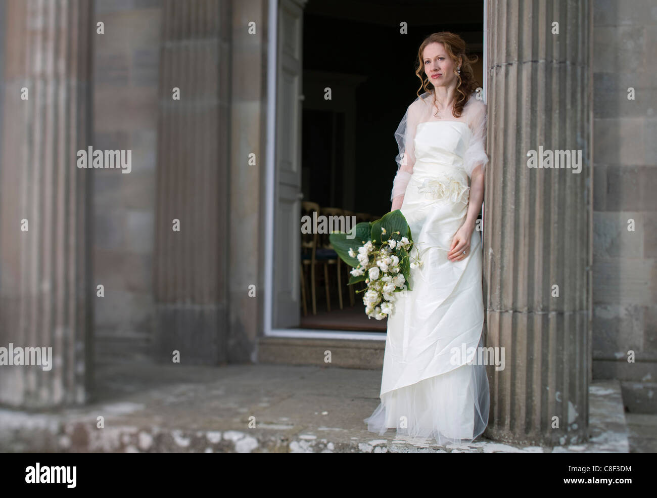 Bride waits outside Stock Photo - Alamy