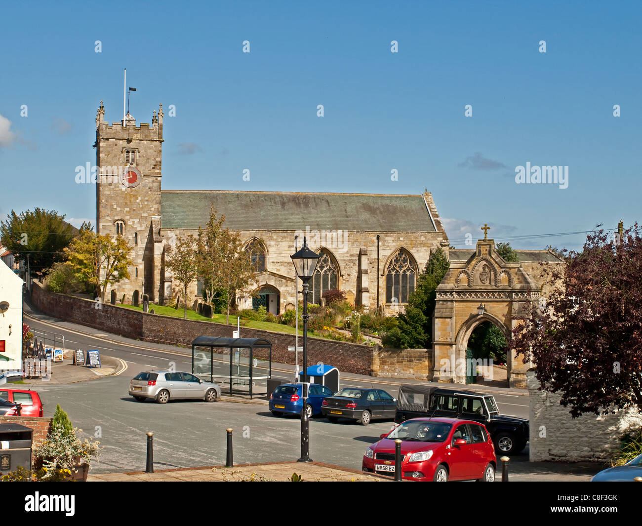 Hunmanby Yorkshire UK Medieval Parish Church and Gateway across village ...