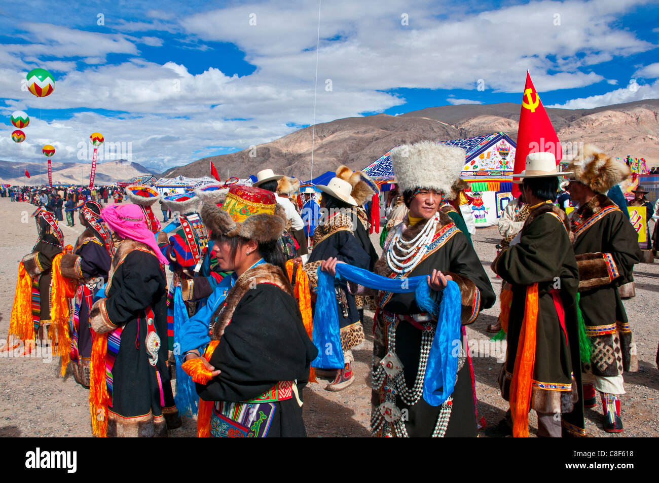 Traditionally dressed Tibetans participating at a local festival, Gerze ...