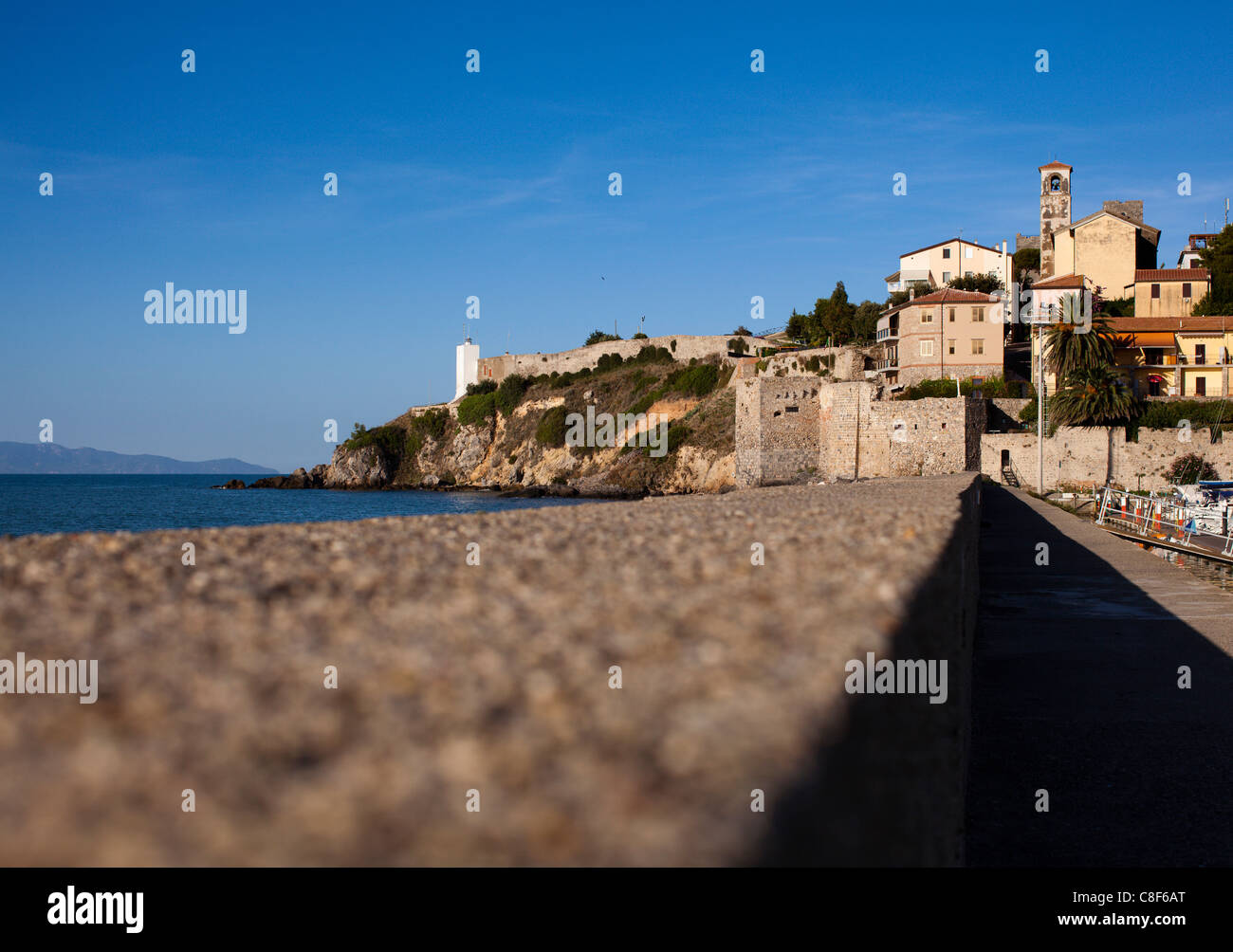 The harbour walls of Talamone. Tuscany, Italy Stock Photo - Alamy