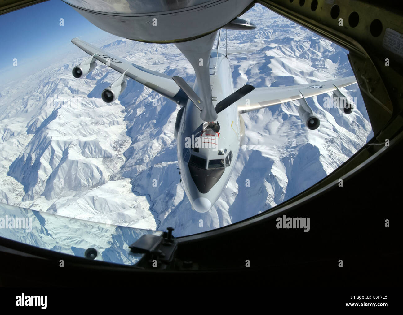 An E-3B Sentry Airborne Warning and Control System aircraft refuels ...