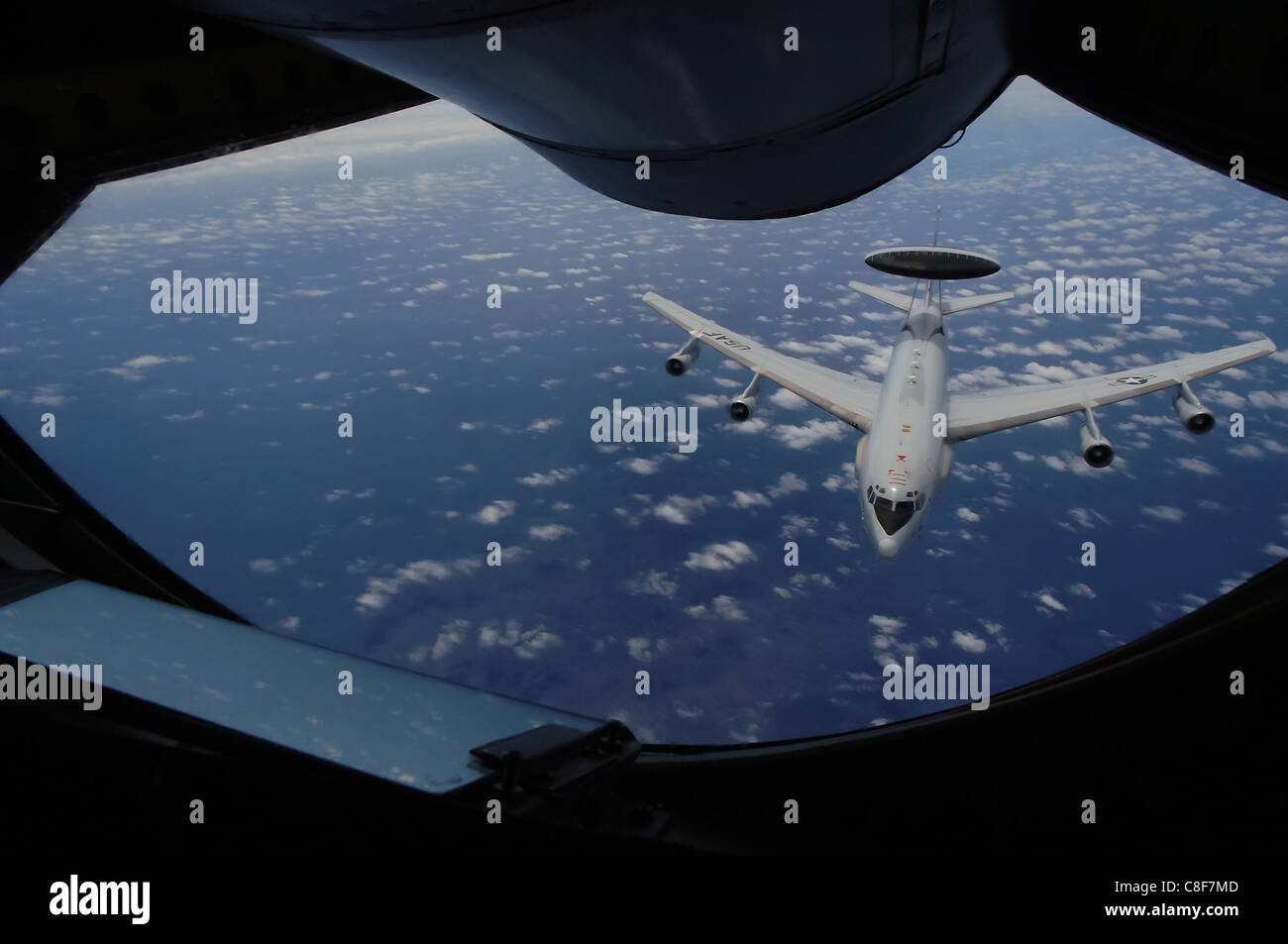 An E-3 Sentry airborne warning and control systems aircraft refuels off ...