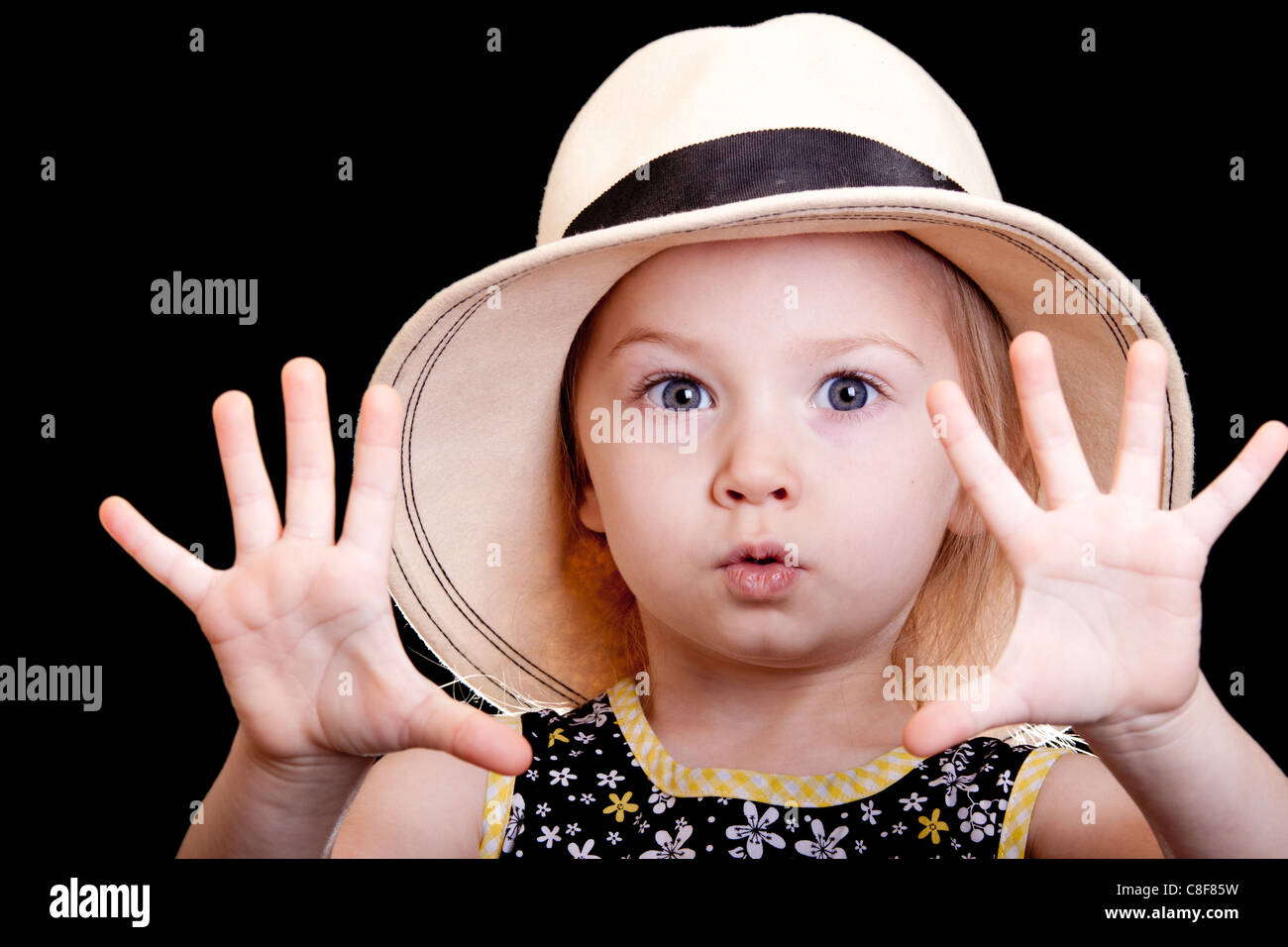 A girl puts her hands out at the viewer Stock Photo - Alamy