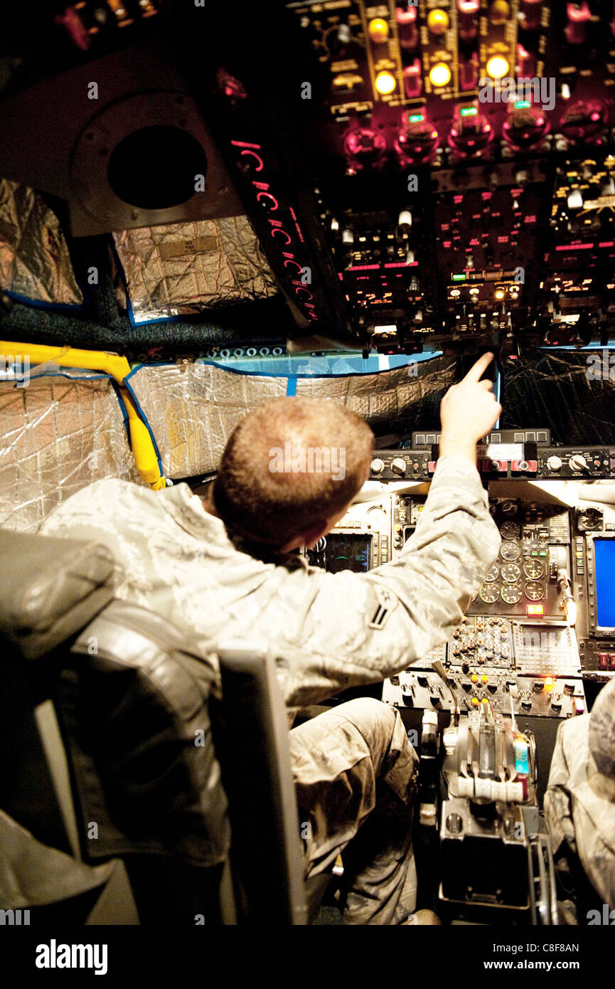 Airman 1st Class Jeremy Lowe conducts a post-flight inspection on a RC ...