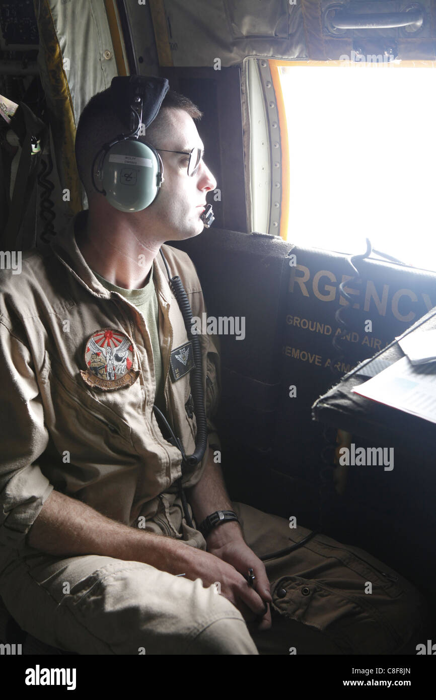 a crewmaster with Marine Aerial Refuler Transport Squadron 152, watches ...