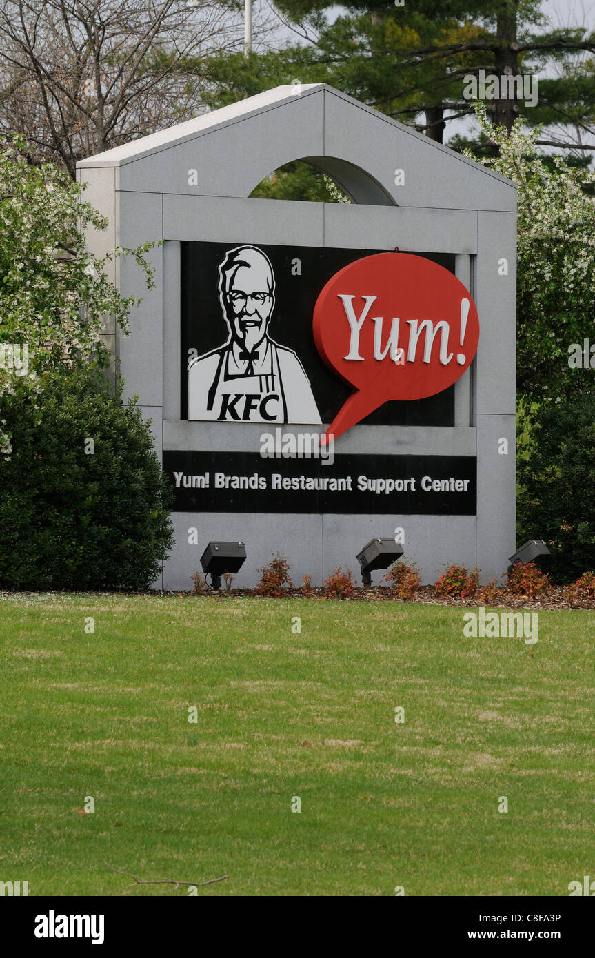 Sign for Yum! Brands Restaurant displaying image of KFC founder Colonel ...