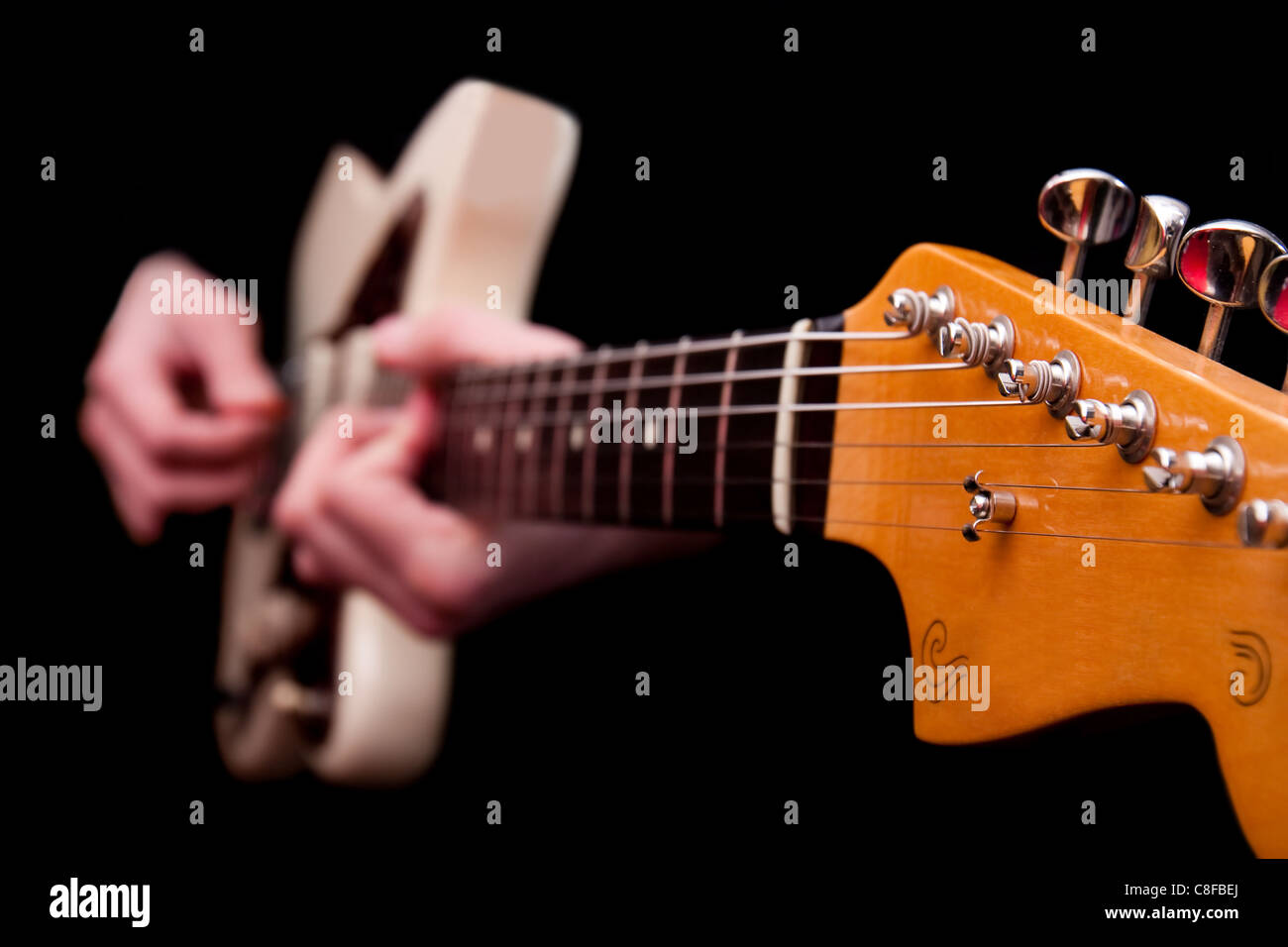 Hands playing guitar hi-res stock photography and images - Alamy