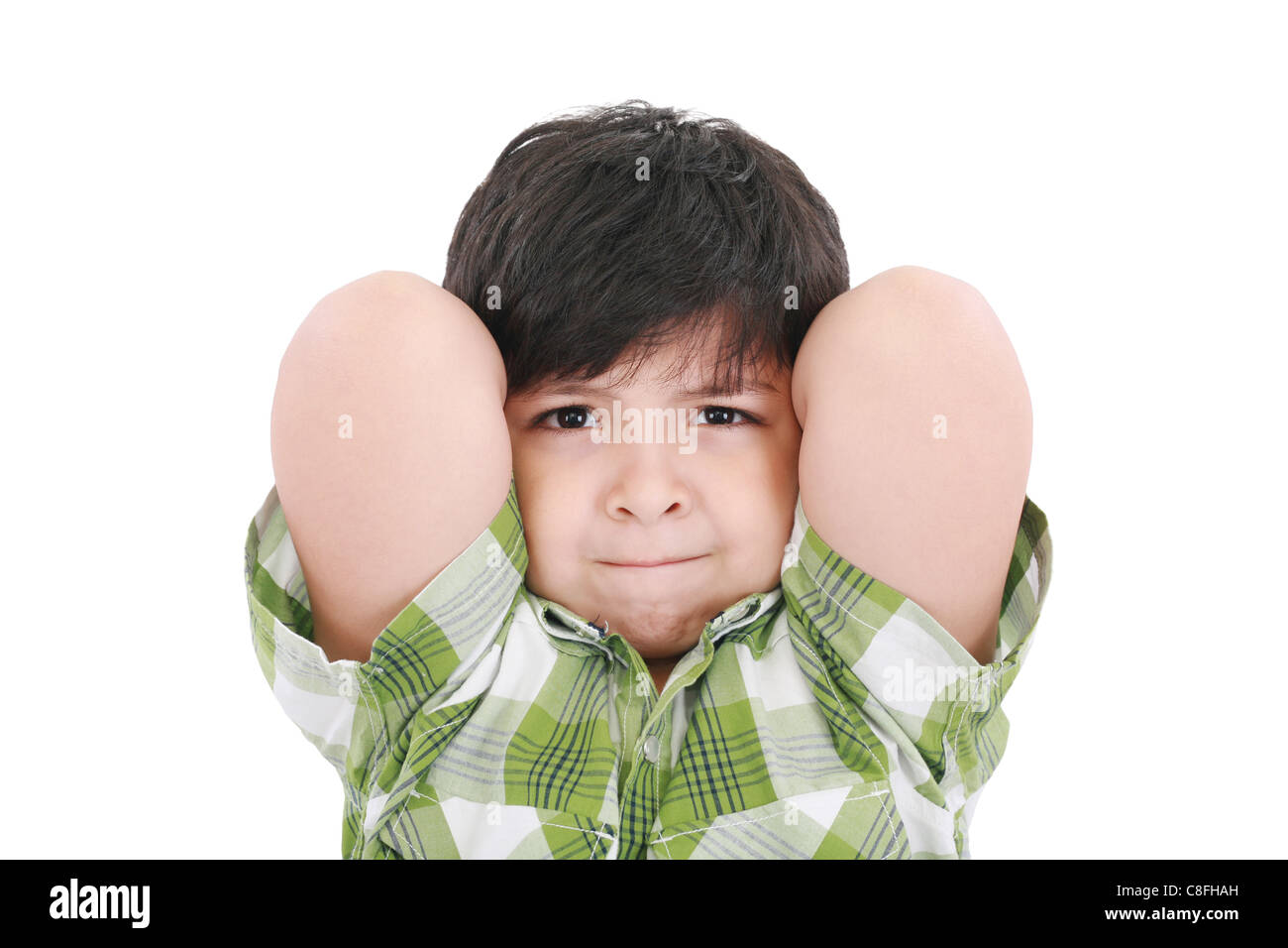 Close up portrait of a young boy child smiling with arms up behind his ...
