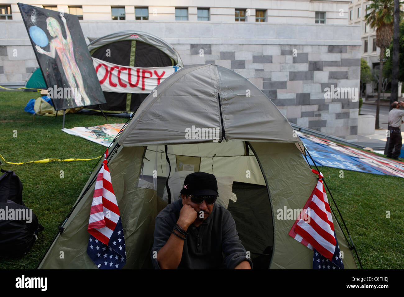 Protesters camp at the Los Angeles City hall in solidarity with Occupy ...