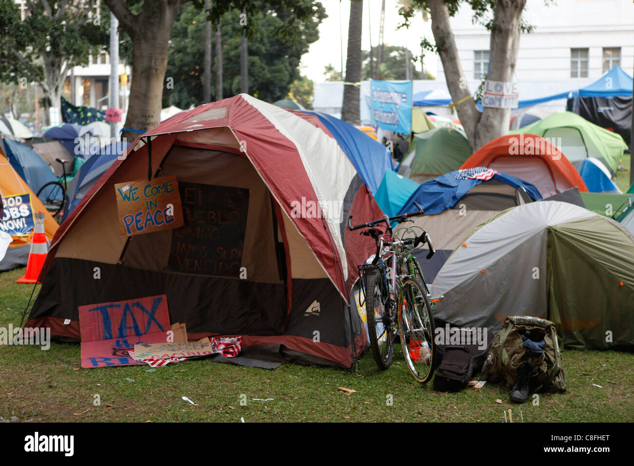 Protesters camp at the Los Angeles City hall in solidarity with Occupy ...