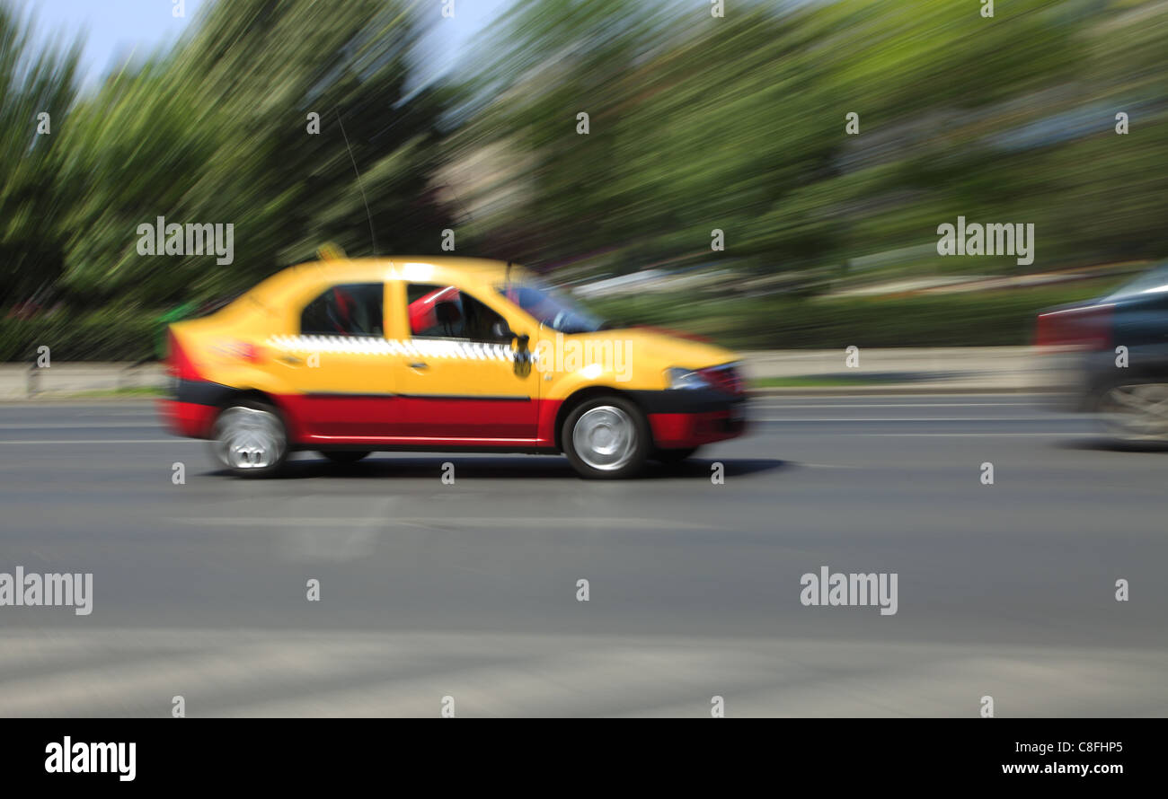 Taxi in motion hi-res stock photography and images - Alamy