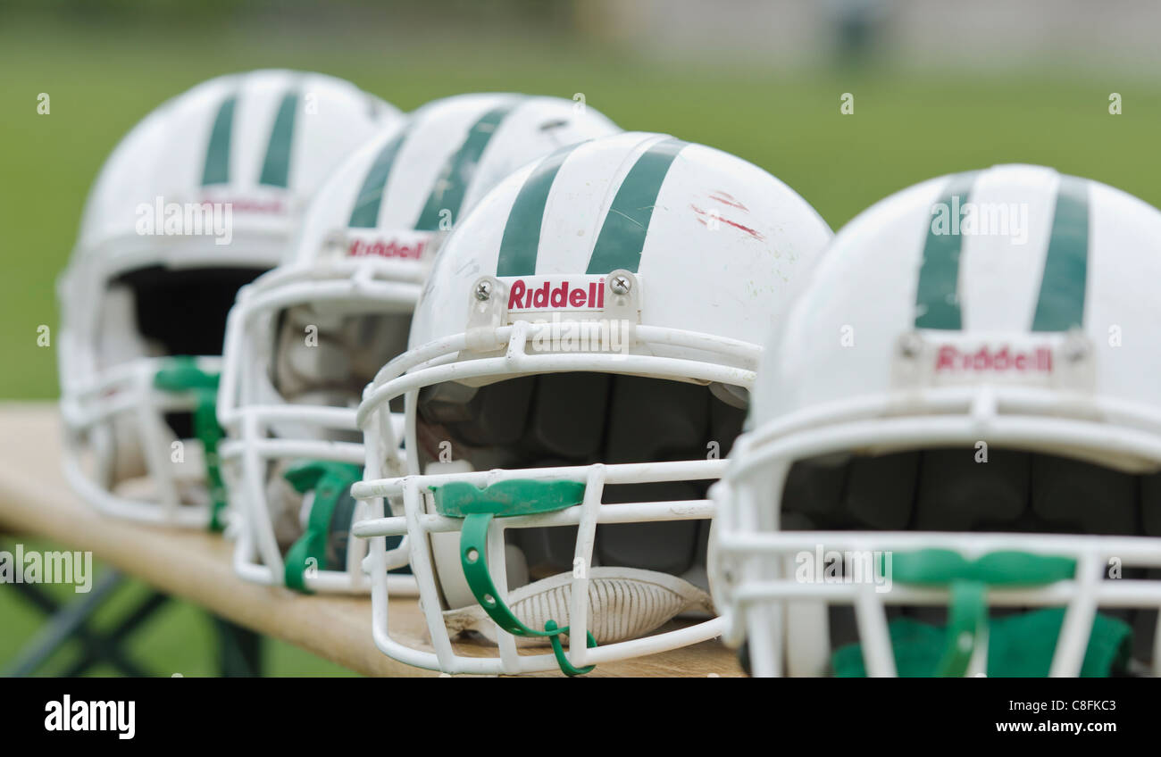 American Football Helmets on a Bench Stock Photo - Alamy