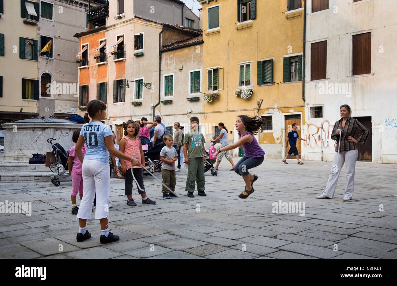 Children playing italy hi-res stock photography and images - Alamy