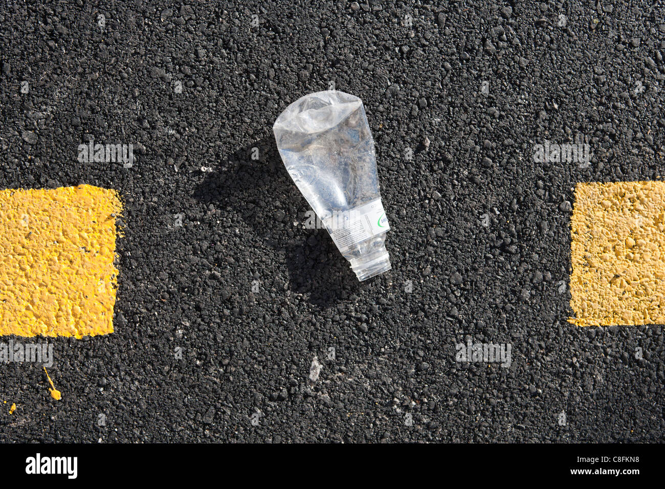 garbage plastic bottle flattened on asphalt street ground floor Stock ...