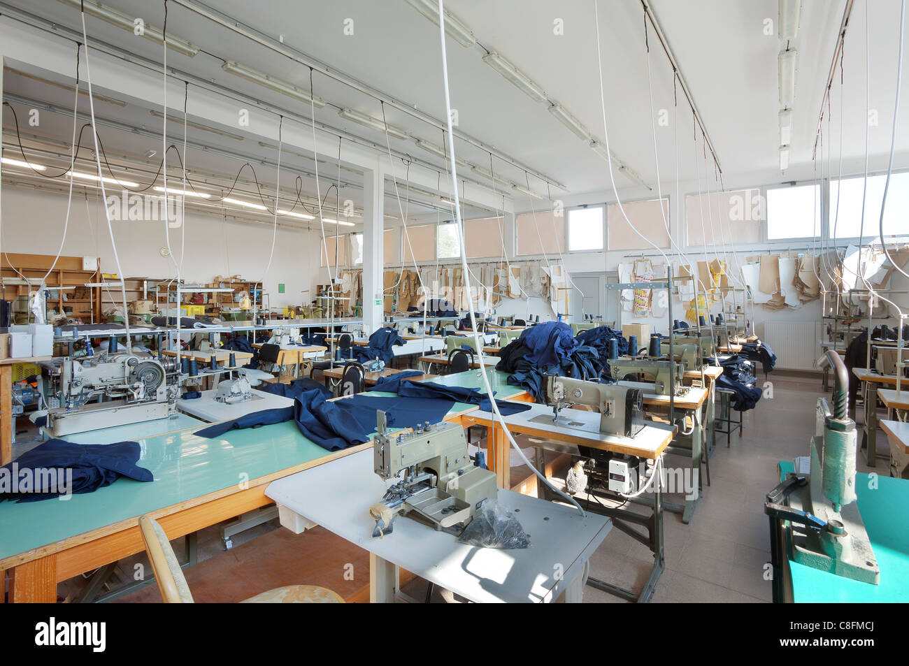 Interior of a sewing company, equipment and materials Stock Photo - Alamy