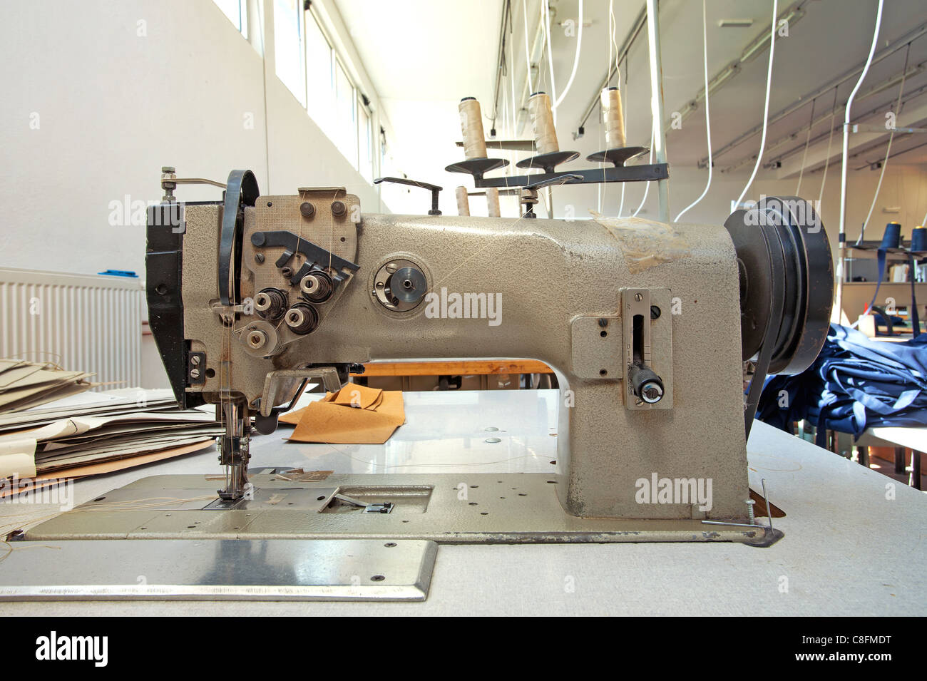 Details of a sewing machine in a factory Stock Photo - Alamy