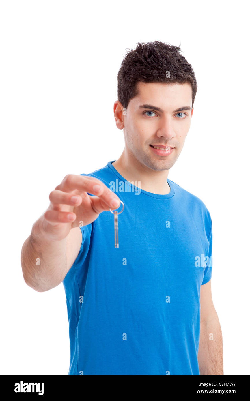 Portrait of a handsome young man holding the keys of your home Stock ...