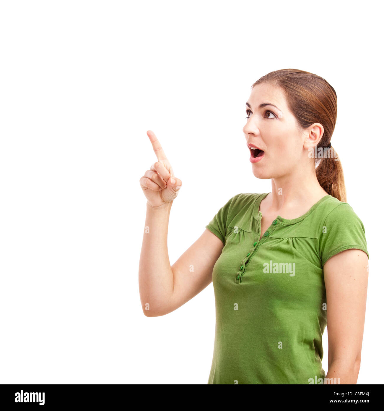 Beautiful young woman pointing up Stock Photo - Alamy