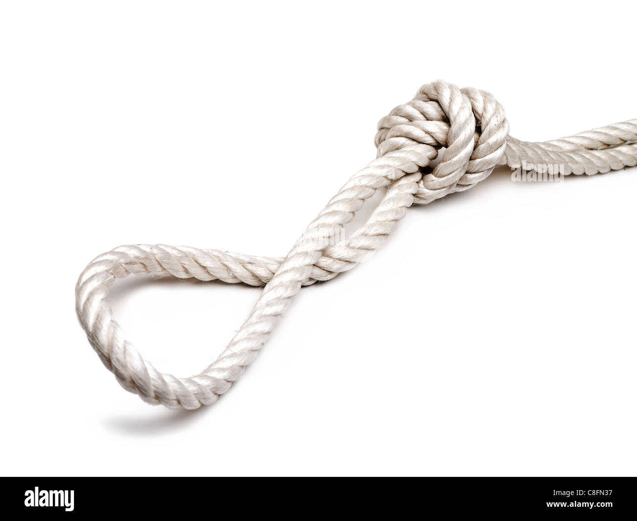 The knot in a rope on white background Stock Photo - Alamy