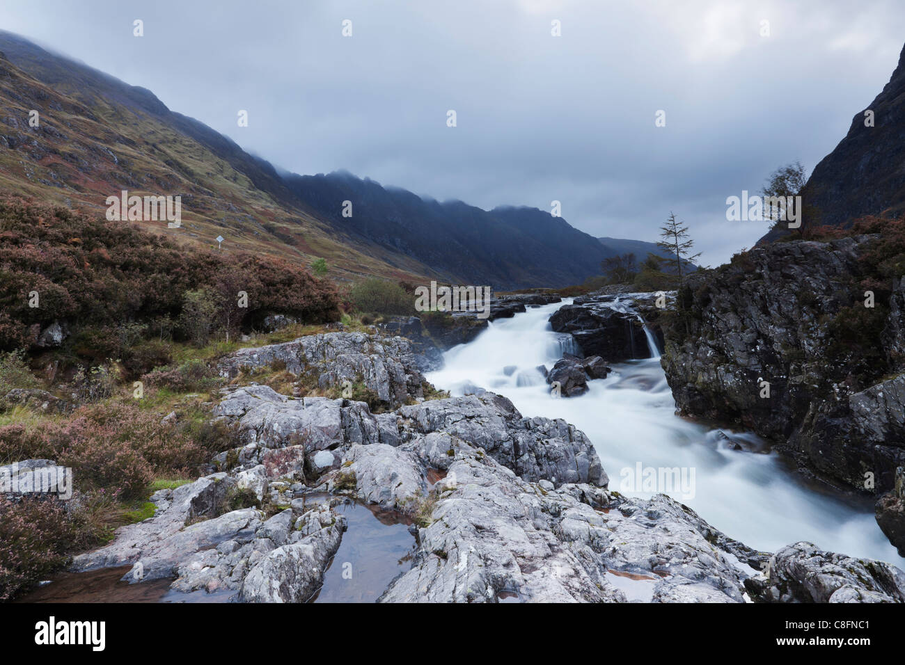 The section of waterfalls on the River Coe, near to the Clachaig Inn at ...