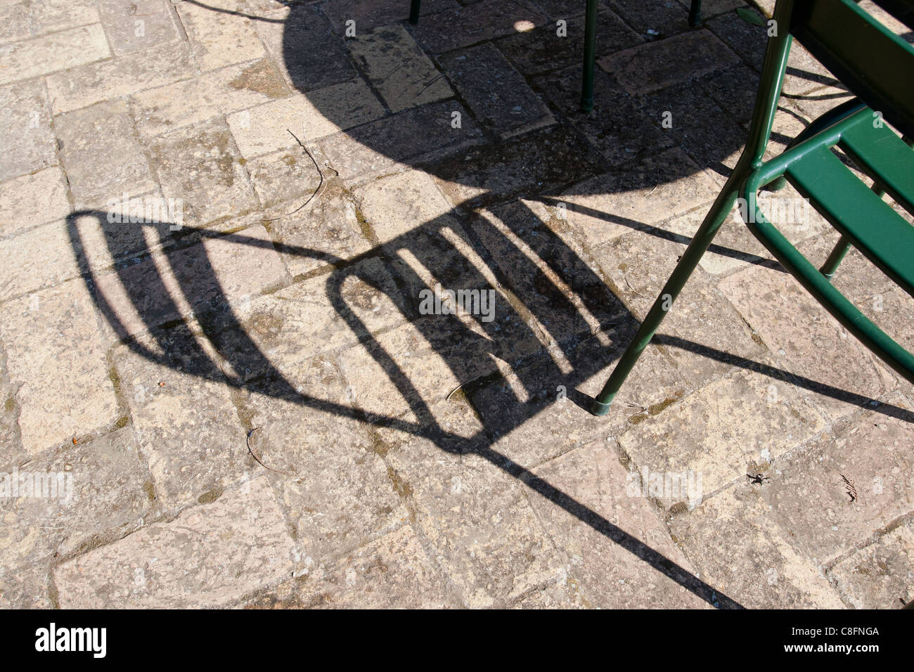 Chair shadow on ground floor Stock Photo - Alamy