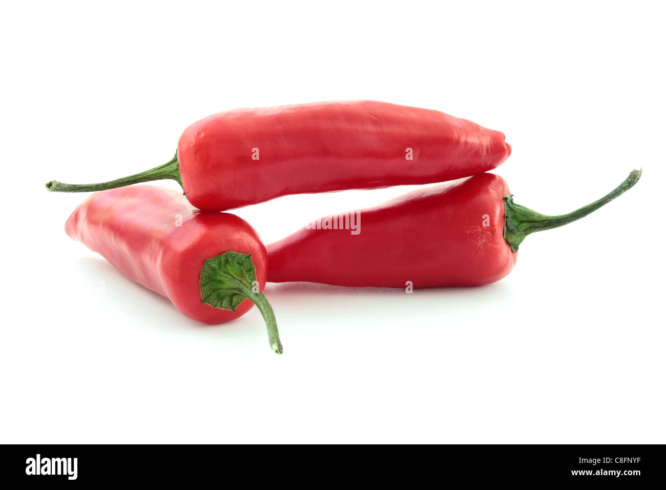 Three red chillies hi-res stock photography and images - Alamy