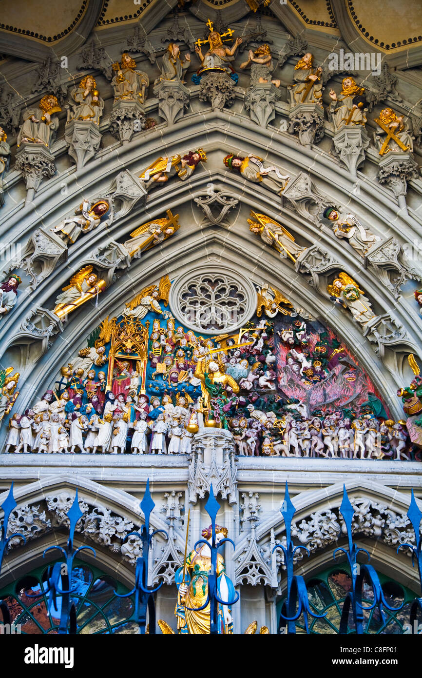 Restored artwork over the main entrance of the cathedral in Bern ...