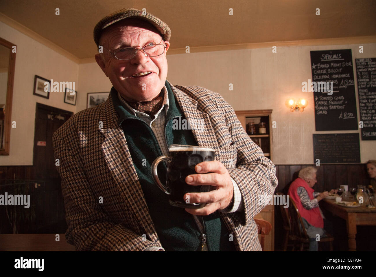 Suffolk raconteur, comedian and author Charlie Haylock having a pint of ...