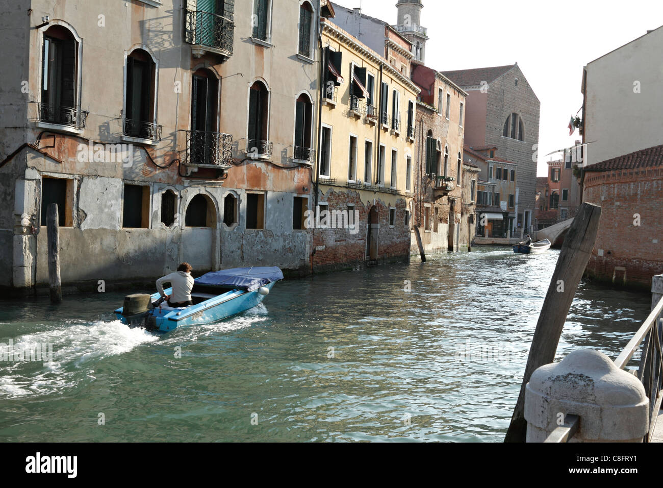 Motor boats on water canal, Venice Italy Stock Photo - Alamy