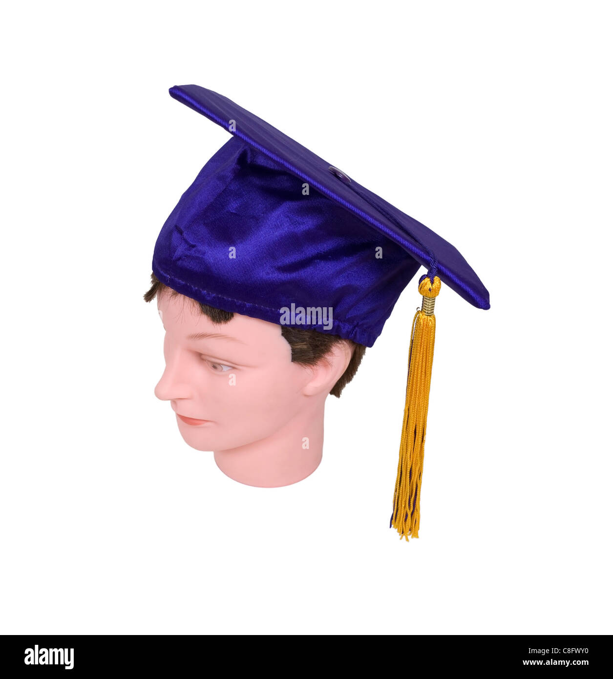 Male graduate wearing the graduation mortar board with tassel used ...