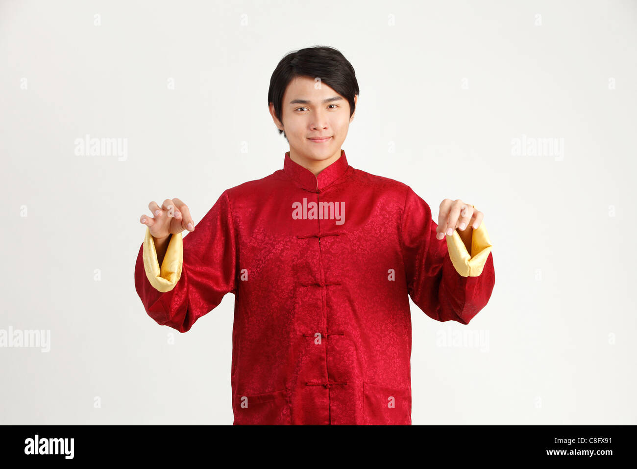 man raising his arm pretend holding something Stock Photo - Alamy