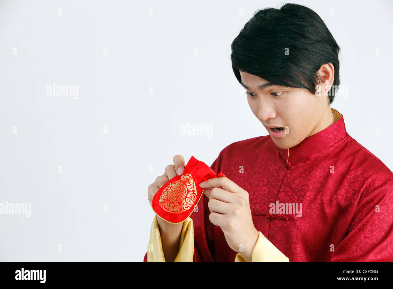 Chinese man traditional clothing silk hi-res stock photography and ...