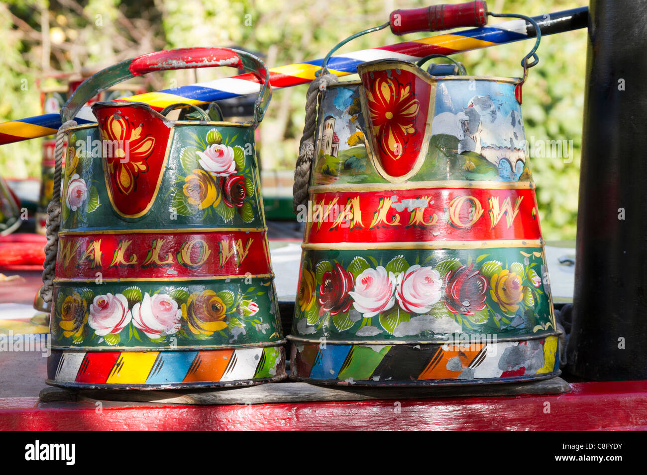 Two narrow boat Buckby cans Stock Photo - Alamy