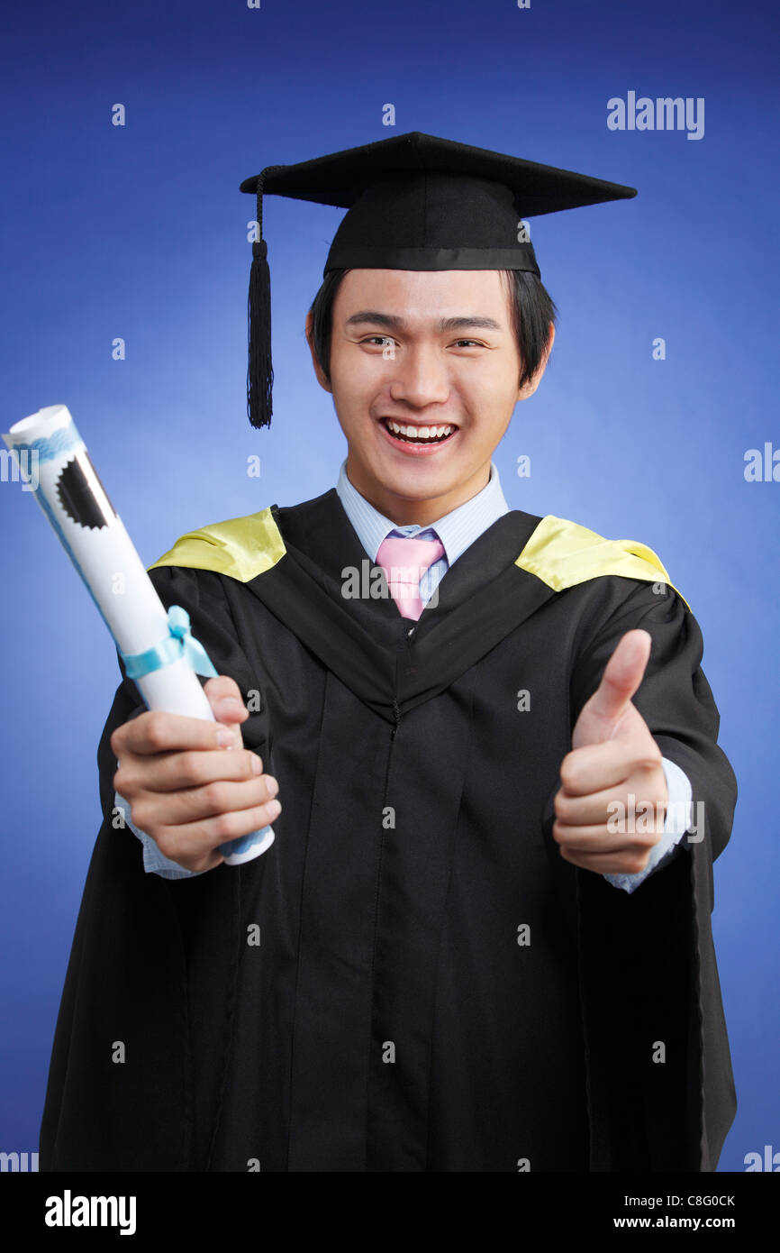 graduated holding diploma Stock Photo - Alamy