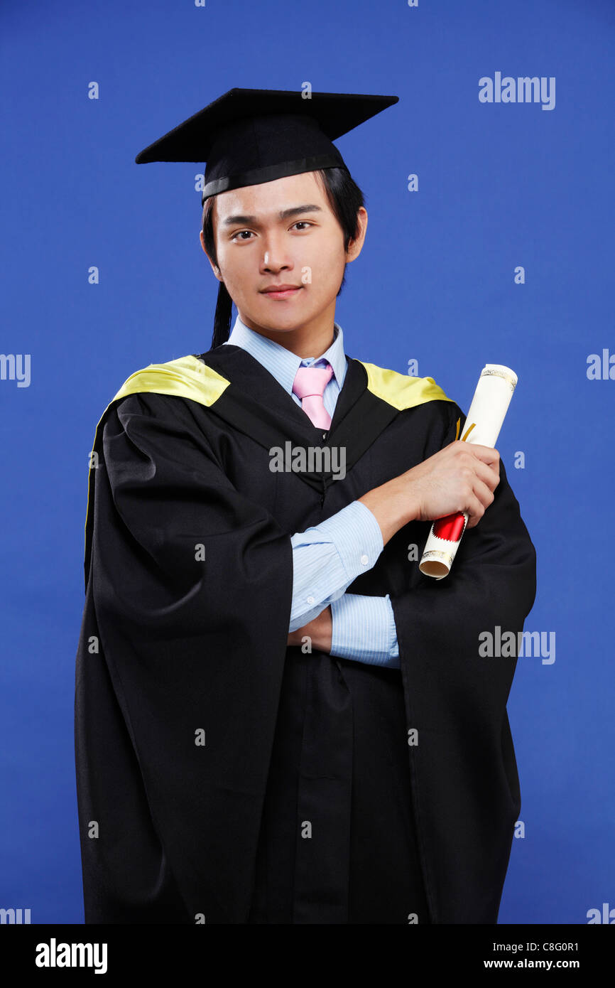 Graduation man diploma raising hi-res stock photography and images - Alamy