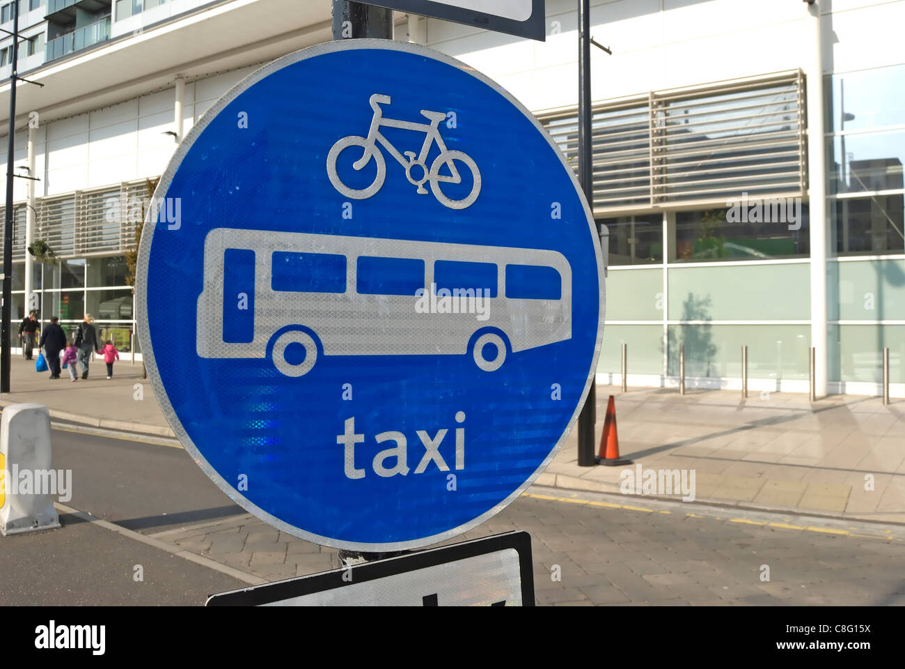 british road sign indicating road restricted to buses, cyclists, and ...