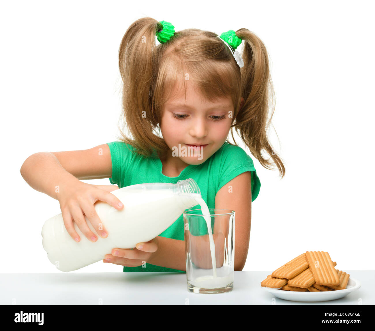 Child pouring milk close up hi-res stock photography and images - Alamy