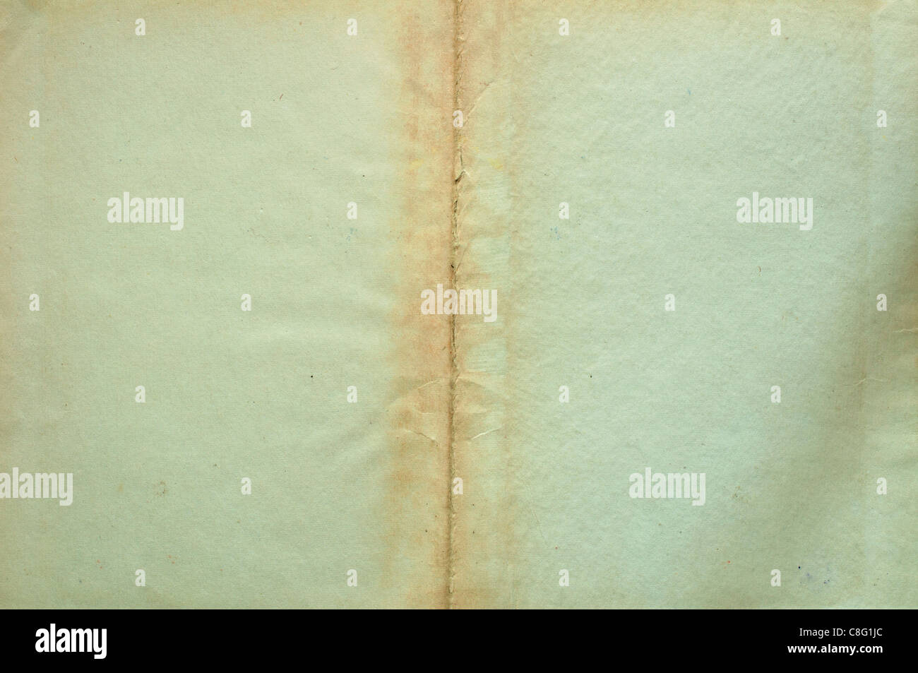 Old worn paper folded hi-res stock photography and images - Alamy
